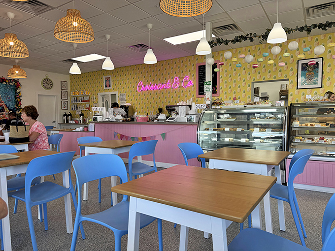 Cheerful chaos of yellow walls and blue chairs &ndash; this isn't just a bakery, it's a mood elevator with pastries as the prescription.