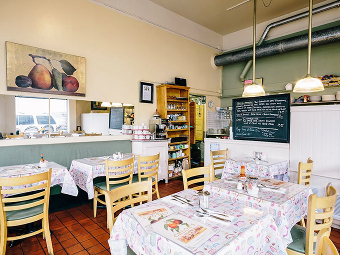 Inside, floral tablecloths and mint-green walls create that rare atmosphere that says "your grandmother's kitchen" if your grandmother were a culinary genius.