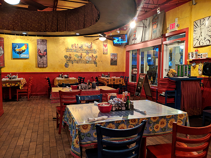 Step inside and the warm yellow walls embrace you like a morning hug, with rooster-themed decor that practically crows "breakfast is serious business here."