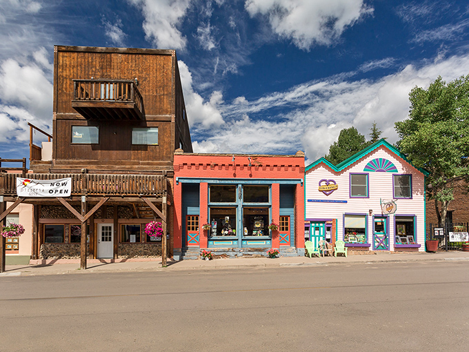 Colorful storefronts stand shoulder-to-shoulder along Creede's main drag, each building telling its own century-old story beneath Colorado's impossibly blue skies.