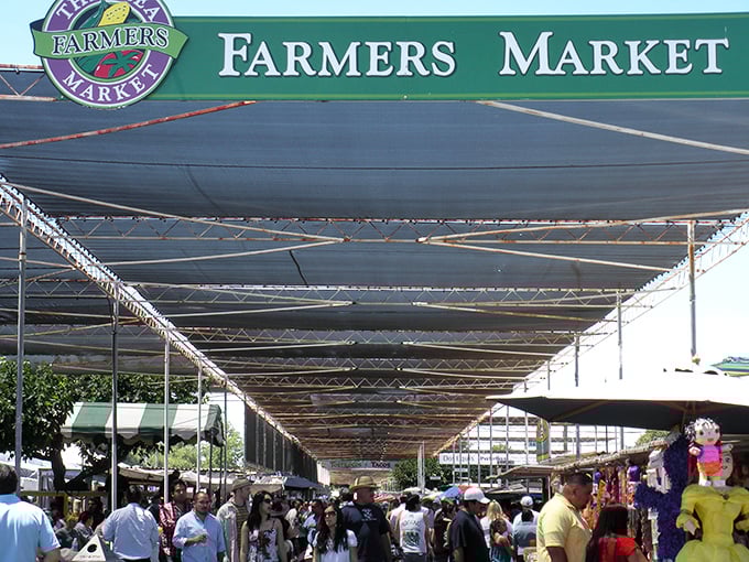 The Farmers Market corridor beckons shoppers into its shaded expanse&mdash;a retail yellow brick road where treasures await at every turn. 