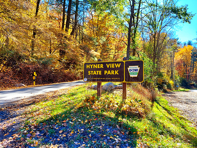 Fall's color palette at its finest. This unassuming entrance sign is like finding the door to Narnia&mdash;ordinary until you step through.