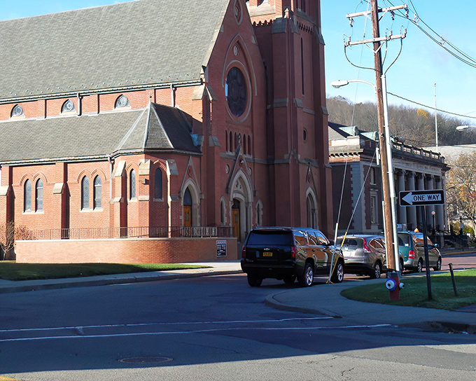 St. Bernard Catholic Church stands as a brick sentinel of faith, its impressive architecture a reminder that spiritual grandeur isn't exclusive to big cities.