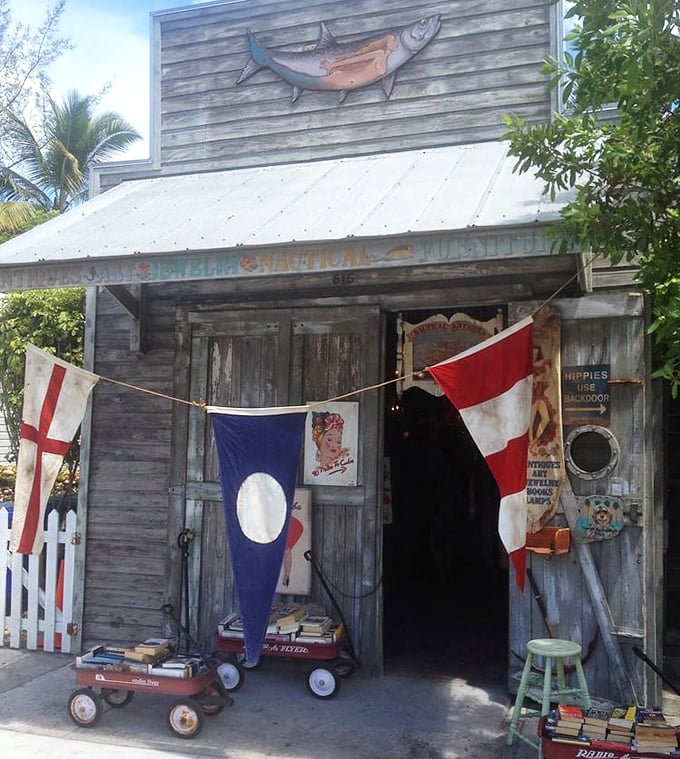 "Hippies Use Back Door" warns the sign at this nautical time capsule, where vintage red wagons loaded with books await their next adventure.