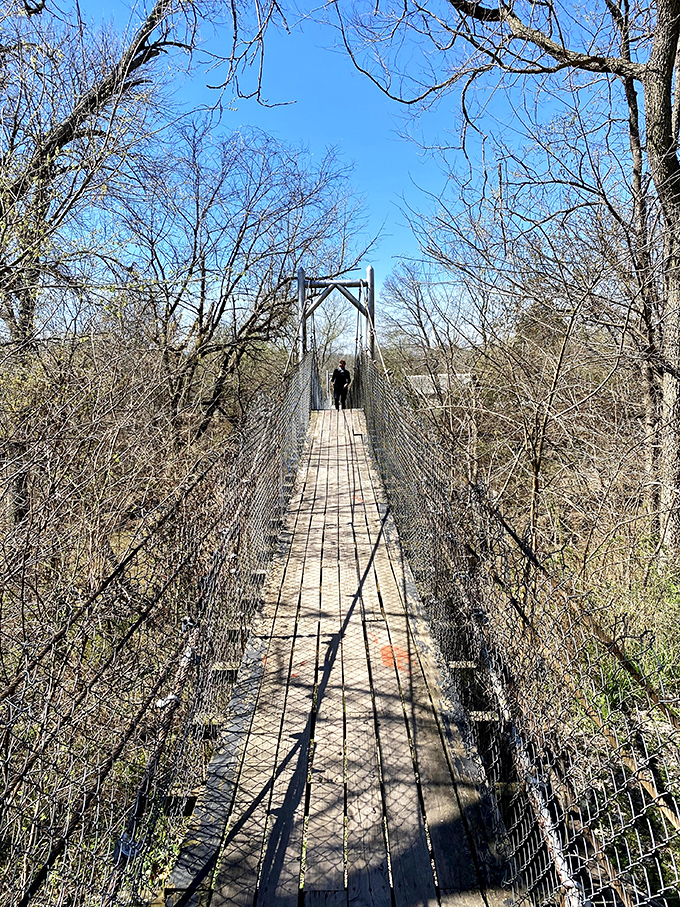 The Swinging Bridge offers both literal and metaphorical passage—each step a gentle bounce between Pawhuska's past and its promising future.
