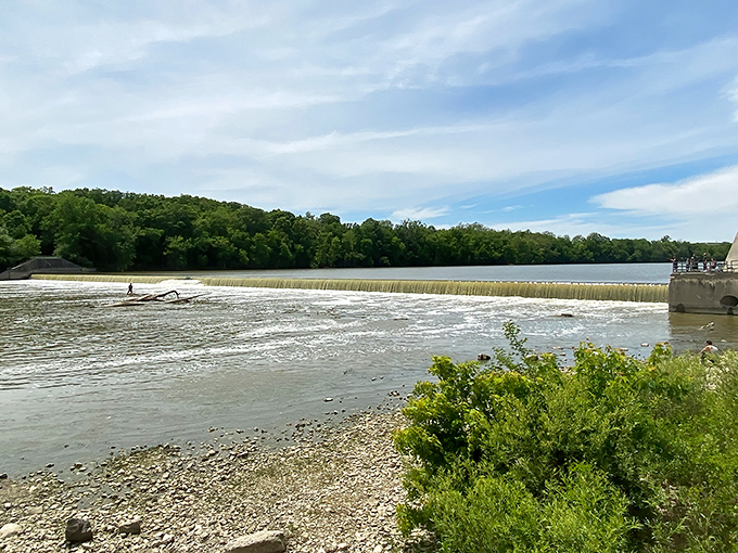 Water doesn't fall, it dances here. The historic dam transforms the Maumee into a shimmering staircase of ripples catching golden afternoon light.