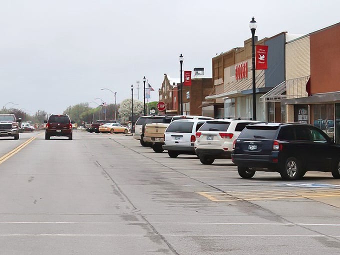 Angled parking and vintage storefronts create that quintessential small-town vibe where your dollar stretches further than your parallel parking skills need to.