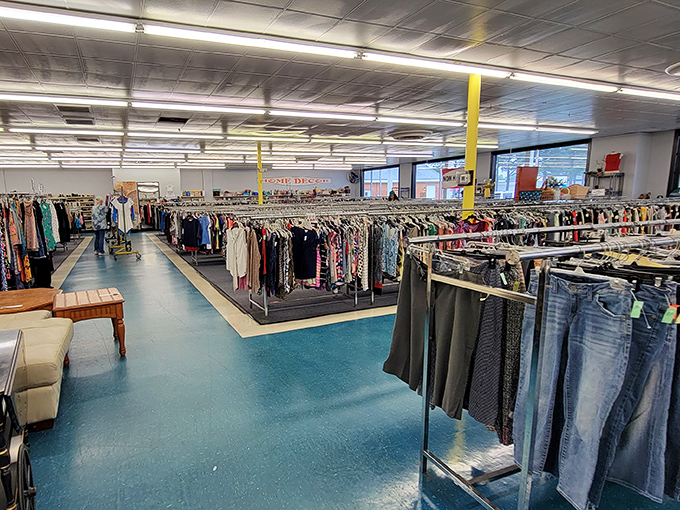 Clothing racks stretch to the horizon like a textile Grand Canyon. Each hanger holds not just fabric, but possibilities and stories waiting to be continued.