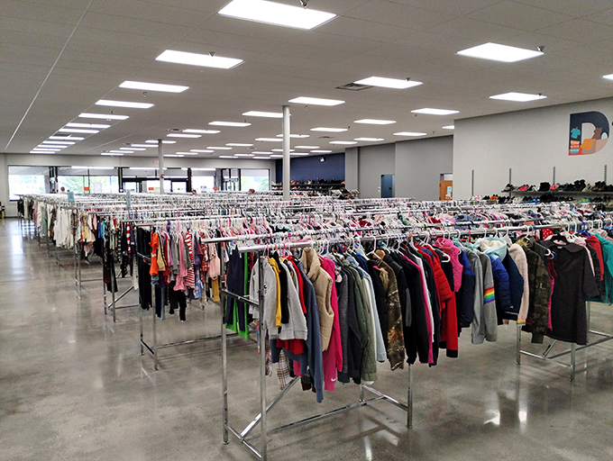 Rack after colorful rack stretches toward the horizon. Each hanger holds not just clothing, but possibilities and stories waiting for their next chapter.