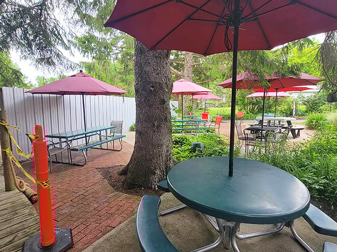 Summer perfection under red umbrellas. This garden-like patio creates the ideal backdrop for savoring nostalgic flavors while making new memories.