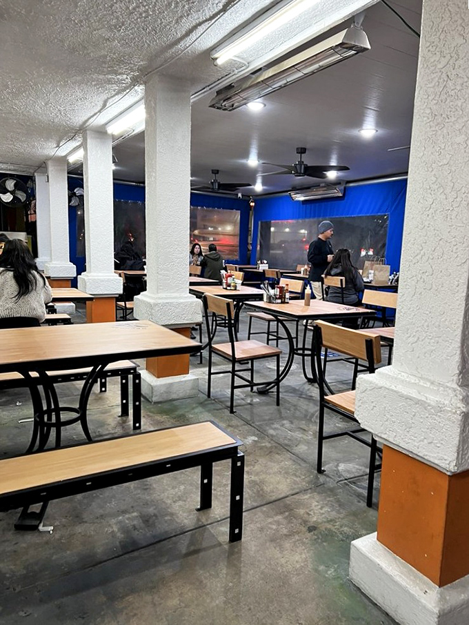 Clean lines and bright blue walls create the perfect backdrop for serious seafood conversations and memorable meals.