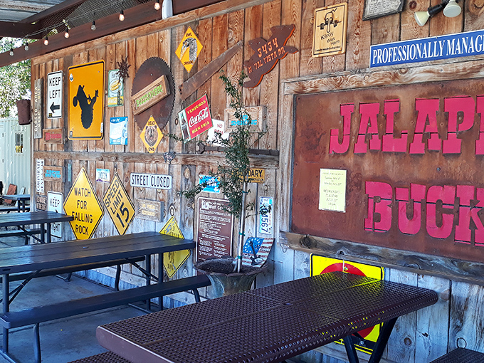 Highway signs meet BBQ heaven. The wall decor alone tells you this place doesn't take itself seriously&mdash;except when it comes to flavor.
