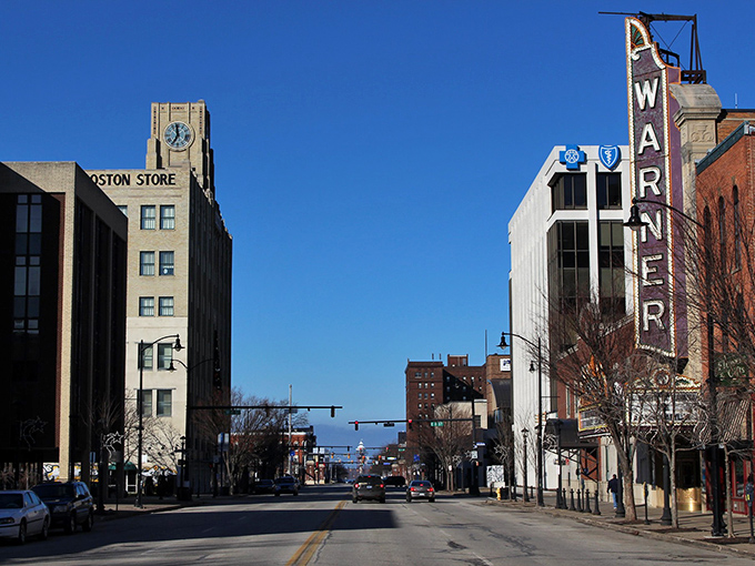 Downtown Erie's historic Warner Theatre sign stands as a beacon of culture, promising entertainment at prices that won't require a second mortgage.