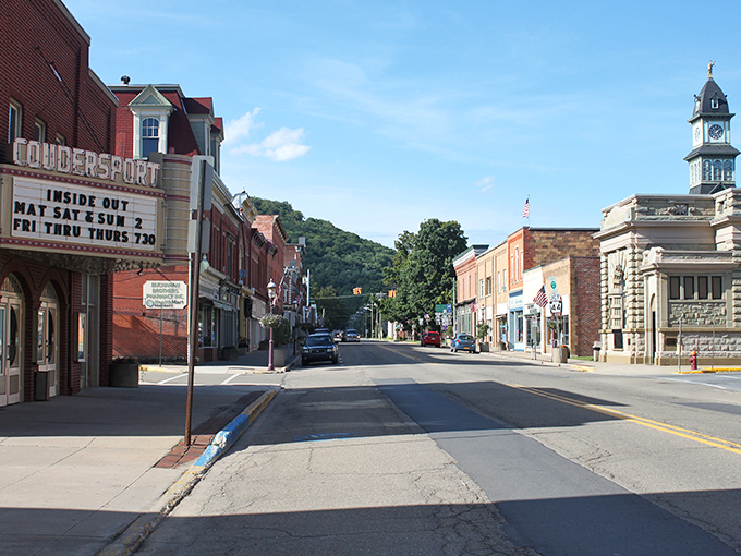 The historic Coudersport Theatre stands proudly alongside the courthouse clock tower, two sentinels of small-town America that have witnessed generations of local stories unfold.