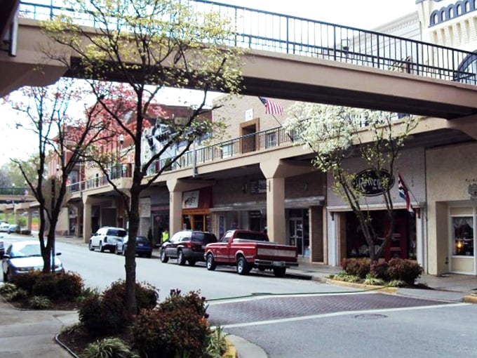 The Skymart walkway system hovers above Main Street like an architectural time capsule, offering shoppers and strollers a bird's-eye view of small-town charm.