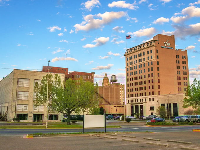 Downtown Monroe's historic buildings stand tall against blue skies, a testament to the city's rich architectural heritage and enduring small-town character.