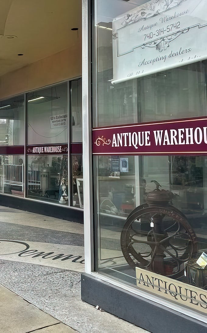 The unassuming storefront belies what awaits inside. That vintage wheel in the window? Just a teaser of the time-travel experience beyond these doors.