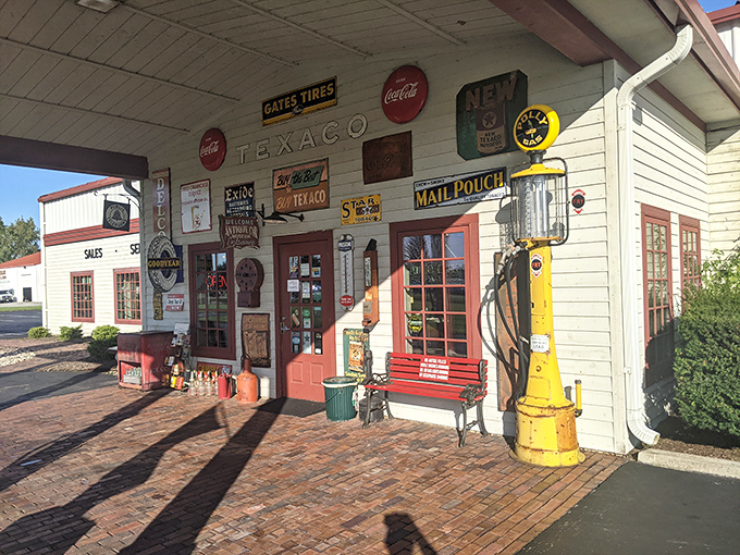 Nostalgia hits you before you even step inside. That yellow pump isn't just decoration; it's a sentinel guarding automotive memories from a simpler era.