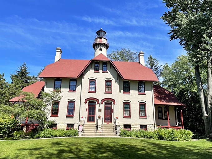 Victorian elegance meets nautical necessity in this cream-colored keeper's house with its distinctive red roof&mdash;architectural eye candy that tells a story of Great Lakes history.