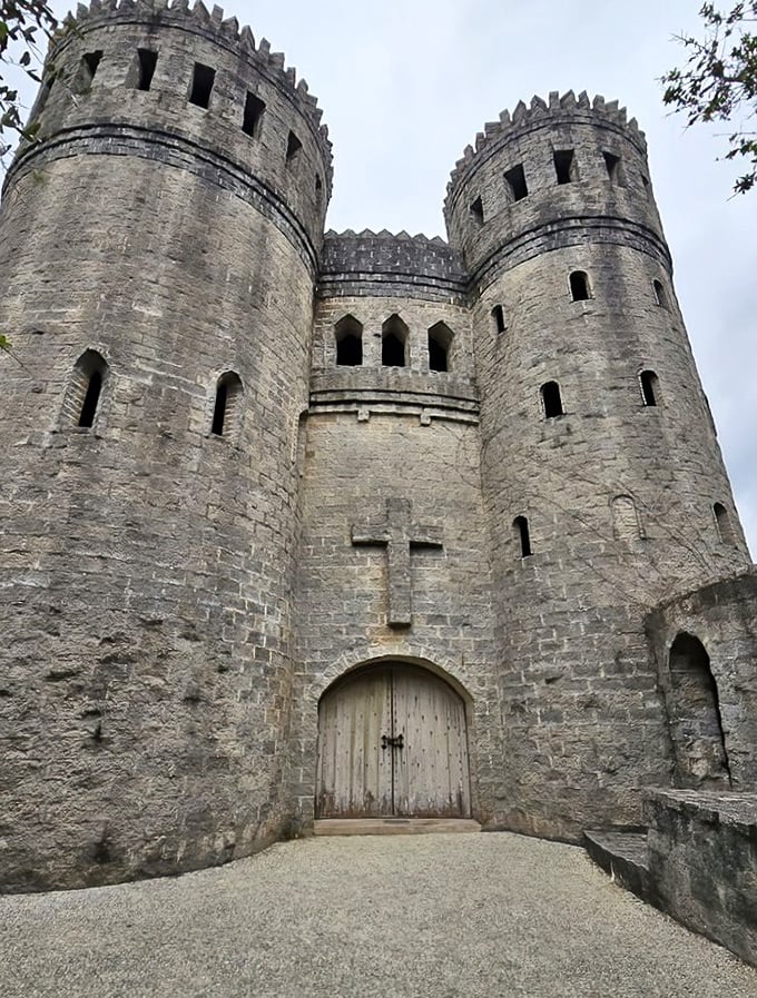 The imposing entrance, complete with weathered wooden doors and cross emblem, looks ready to withstand both invading armies and Florida hurricanes.