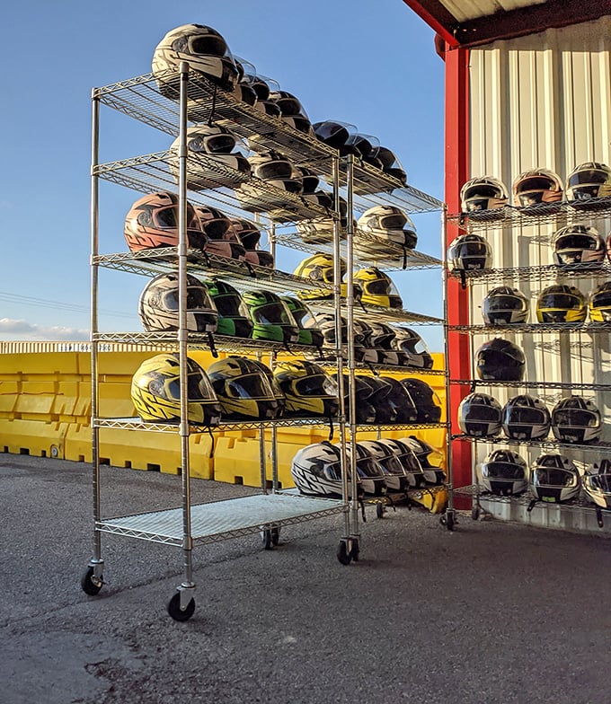 A rainbow armada of helmets awaits, each one transforming ordinary citizens into speed demons with delusions of motorsport grandeur.