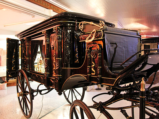This ornate horse-drawn hearse from the Victorian era puts modern luxury vehicles to shame with its intricate woodwork and brass fittings&mdash;the original luxury ride.