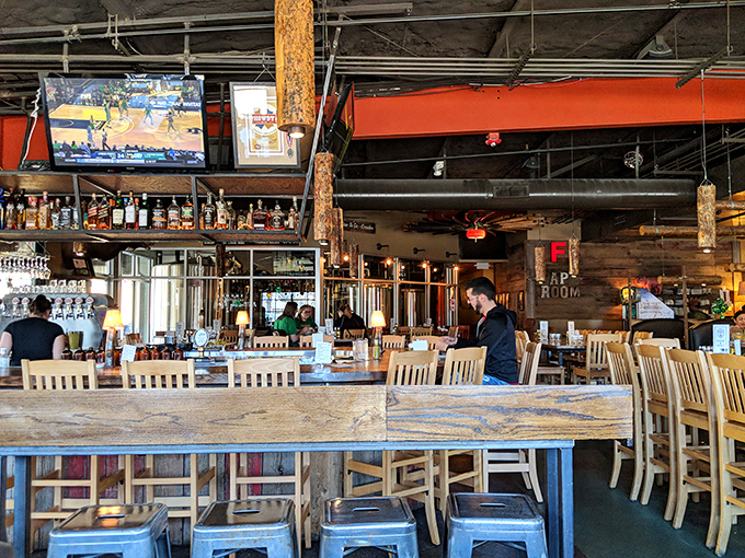 The bar area invites you to pull up a stool and stay awhile &ndash; part brewery, part community living room, all comfort.