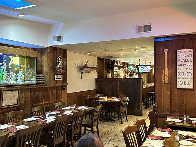 Step inside to a nautical wonderland where wood paneling, mounted fish, and Jersey Shore signage transport you from suburban Pennsylvania to seaside dining.