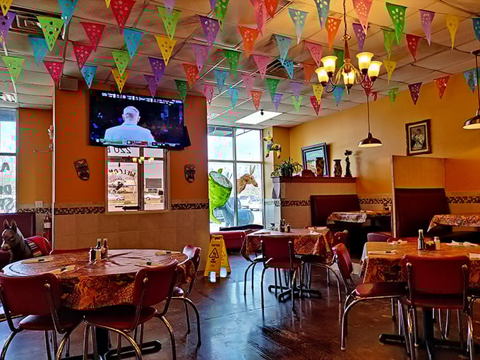 Colorful papel picado banners create a perpetual fiesta atmosphere inside, where every meal feels like a celebration worth remembering.