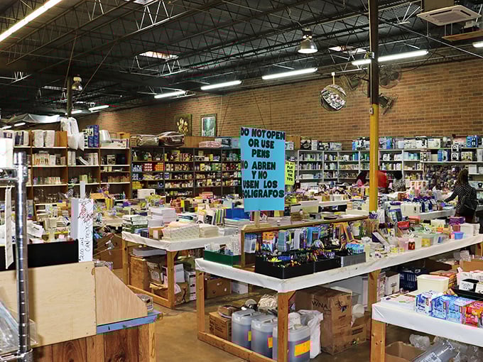 Inside this brick labyrinth, every aisle promises adventure. The blue sign's bilingual warning hints at the market's cultural crossroads where bargains transcend language barriers.