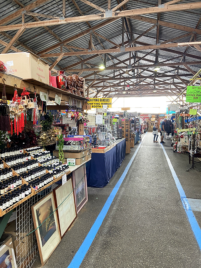 Long, covered walkways stretch into retail infinity. The blue lines aren't just decoration&mdash;they're breadcrumbs to help you find your way back to reality.