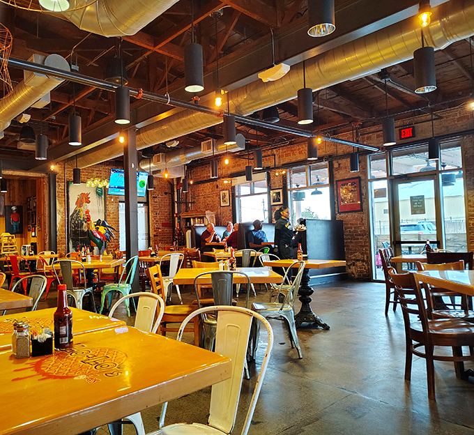 Industrial-chic meets soul food haven in Lo-Lo's interior, where exposed brick and wooden tables create the perfect backdrop for the comfort food drama about to unfold.