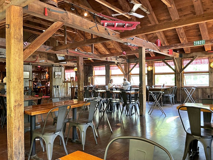 Exposed wooden beams and industrial-chic seating create the perfect marriage of rustic New England and modern comfort. Breakfast with architectural bragging rights!