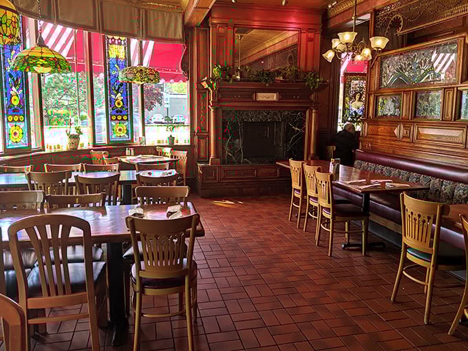 Step inside and time travel to a more elegant era, where stained glass windows filter sunlight onto wooden tables that have hosted countless Sunday morning revelations.