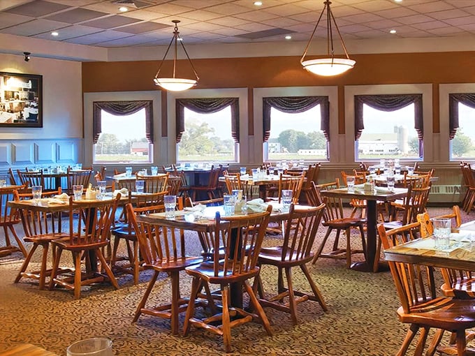 Warm wooden chairs and natural light create the perfect backdrop for memory-making meals. Like Grandma's dining room, but with better lighting.