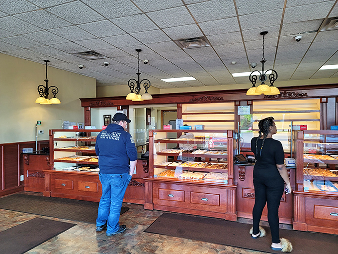 Where bakery dreams come true! Customers ponder life's most important question: "How many pastries is too many?" (Spoiler: there's no such thing).