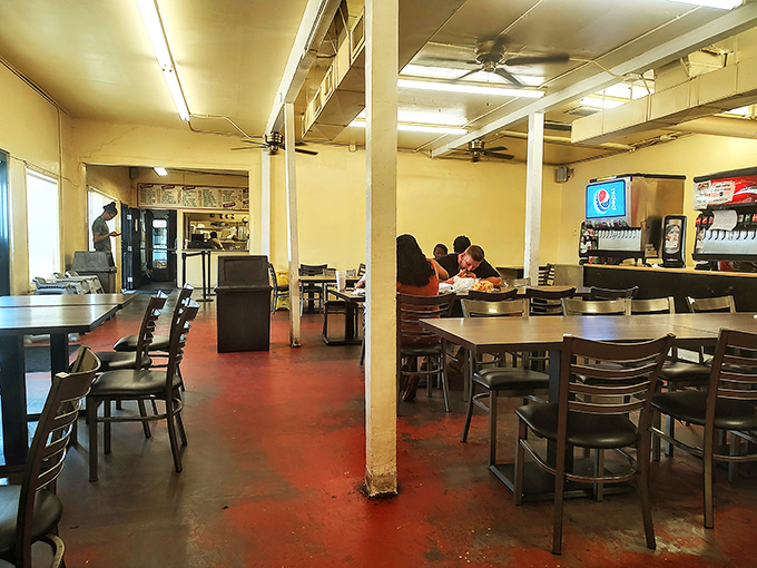 Inside, no-frills decor lets the food do all the talking. Red floors and simple furnishings set the stage for culinary magic.