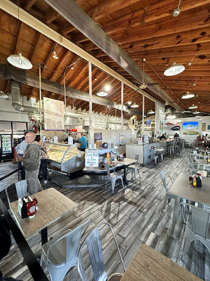 Wooden beams overhead, metal chairs below, and the promise of ocean-fresh delights everywhere in between. Simplicity at its most delicious.