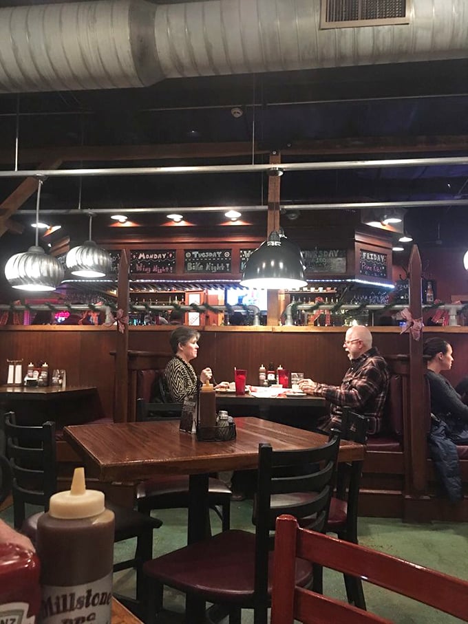 Wood paneling, industrial lighting, and the murmur of satisfied diners—this is the temple where barbecue pilgrims come to worship.