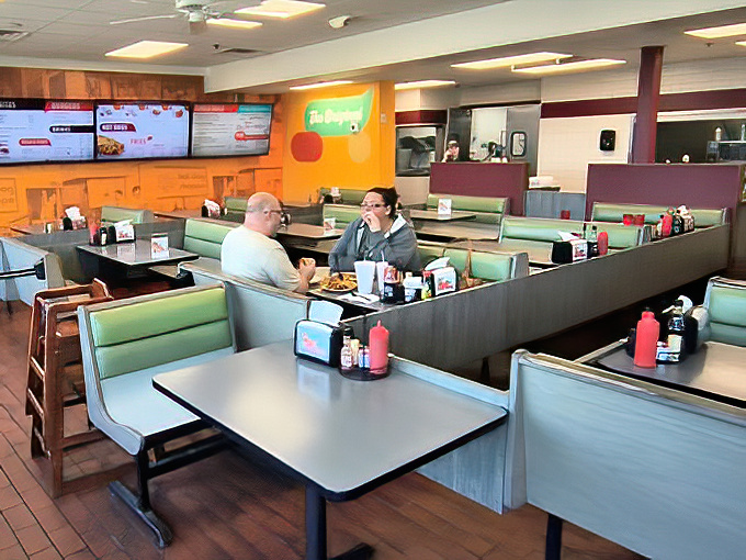 Mint-green booths create the perfect backdrop for lunchtime conversations that have been happening here for generations.