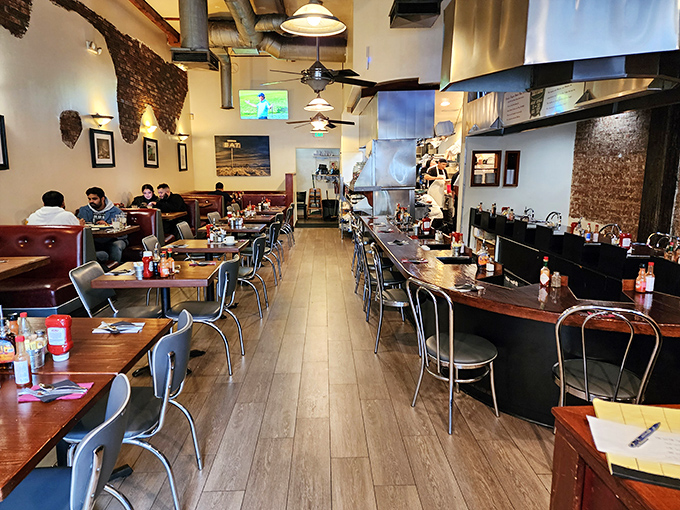 Industrial chic meets comfort food paradise where exposed brick whispers tales of countless syrup-soaked morning victories.