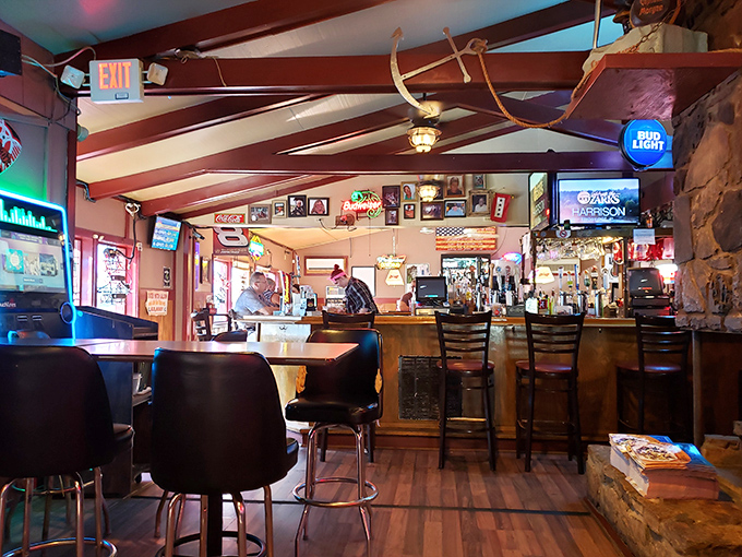 Step inside and you're greeted by that perfect blend of sports bar meets family diner&mdash;wooden beams, stone accents, and neon signs creating an atmosphere that says "stay awhile."