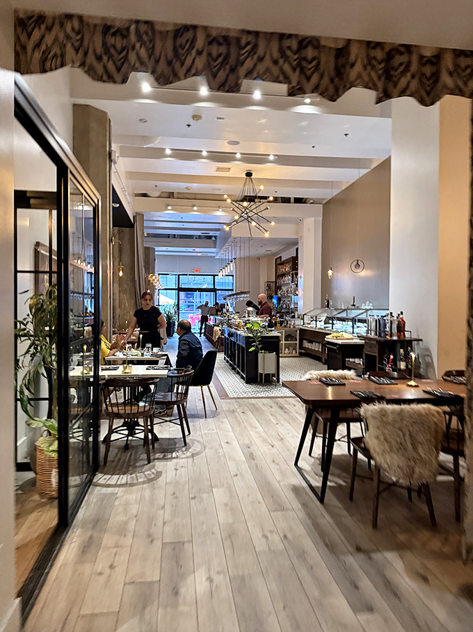 Where meat dreams come true. Light wood floors, elegant lighting, and cowhide chairs create the perfect backdrop for the parade of proteins about to grace your table.