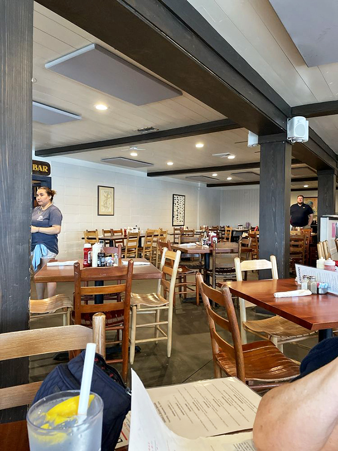 Simple wooden tables and chairs tell you everything you need to know&mdash;this place prioritizes what's on your plate, not what's holding it up.