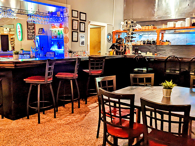 Inside, the bar area strikes that perfect balance between "neighborhood haunt" and "place you'd bring someone you want to impress."