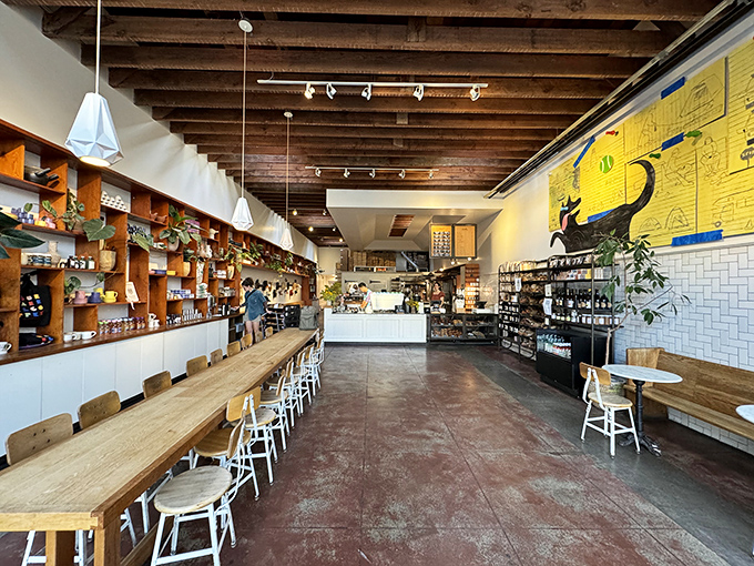 Exposed beams, subway tiles, and communal tables create the perfect storm of rustic elegance and urban sophistication. 