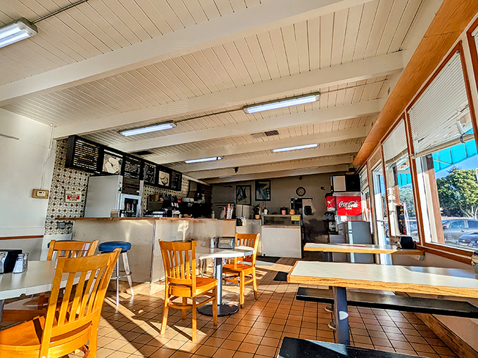 Sunlight streams through windows onto wooden chairs that have supported thousands of satisfied customers. No fancy design awards needed when the food's this good.