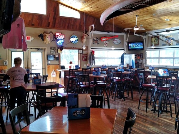 The warm wooden interior feels like a cozy cabin that happens to serve spectacular seafood. That pine ceiling would make Joanna Gaines proud while you make that lobster roll disappear.