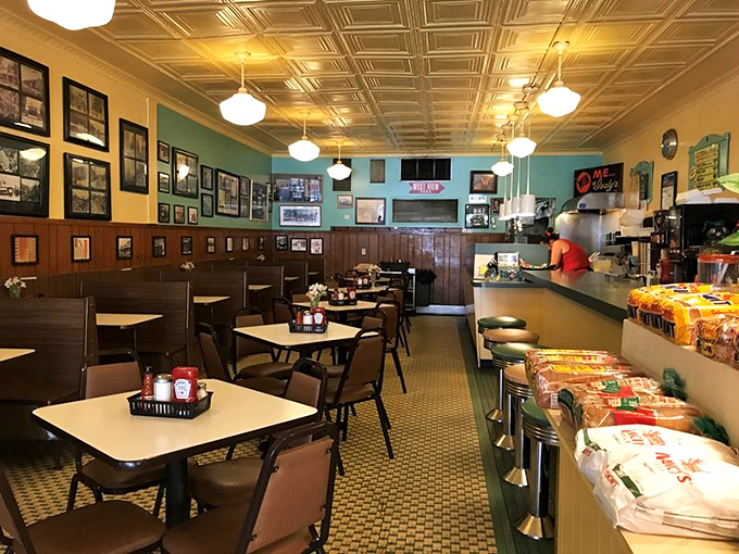 Step inside and time stands still &ndash; mint green walls, vintage photographs, and those iconic tin ceiling tiles create the perfect backdrop for comfort food conversations.