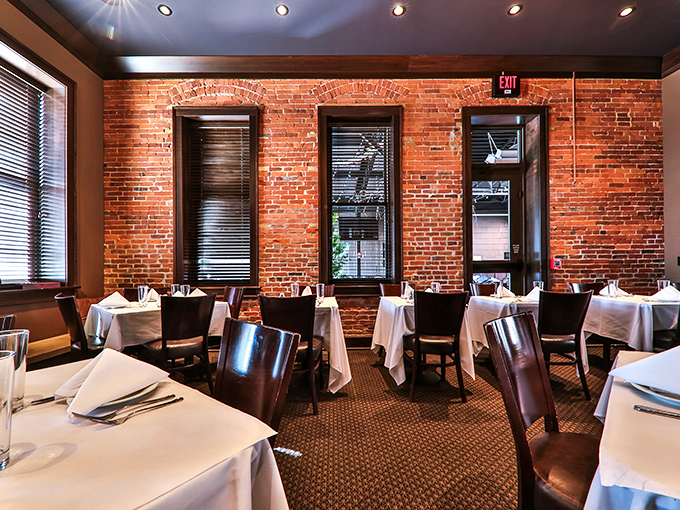 Exposed brick walls and white tablecloths create that perfect "special yet comfortable" vibe. Like wearing your best jeans to a concert.